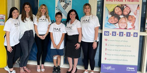 St. Jane Frances students stand with each other during National ...